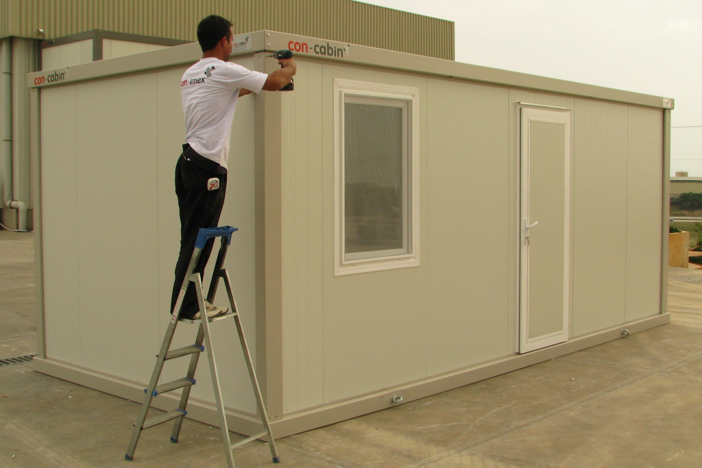 Con-imex Living Containers. FLATPACKED SINGULAR DEMOUNTABLE CONTAINERS